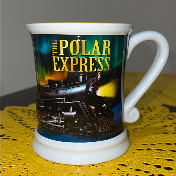 Warner Bros. | Dining | Warner Bros Polar Express Mug White And Yellow ...
